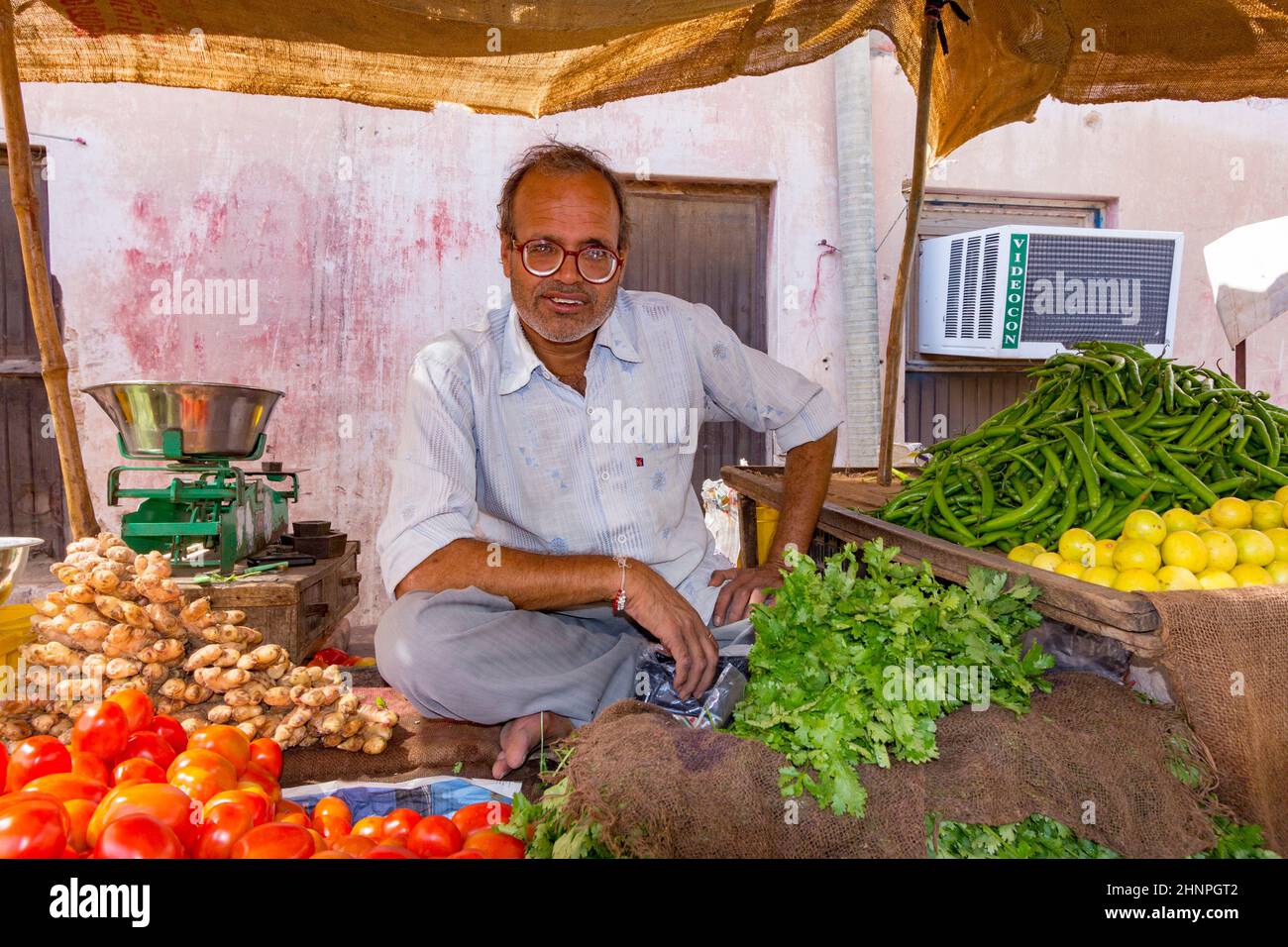 people sell their fresh fruits and vegetables at the outdoor market in ...