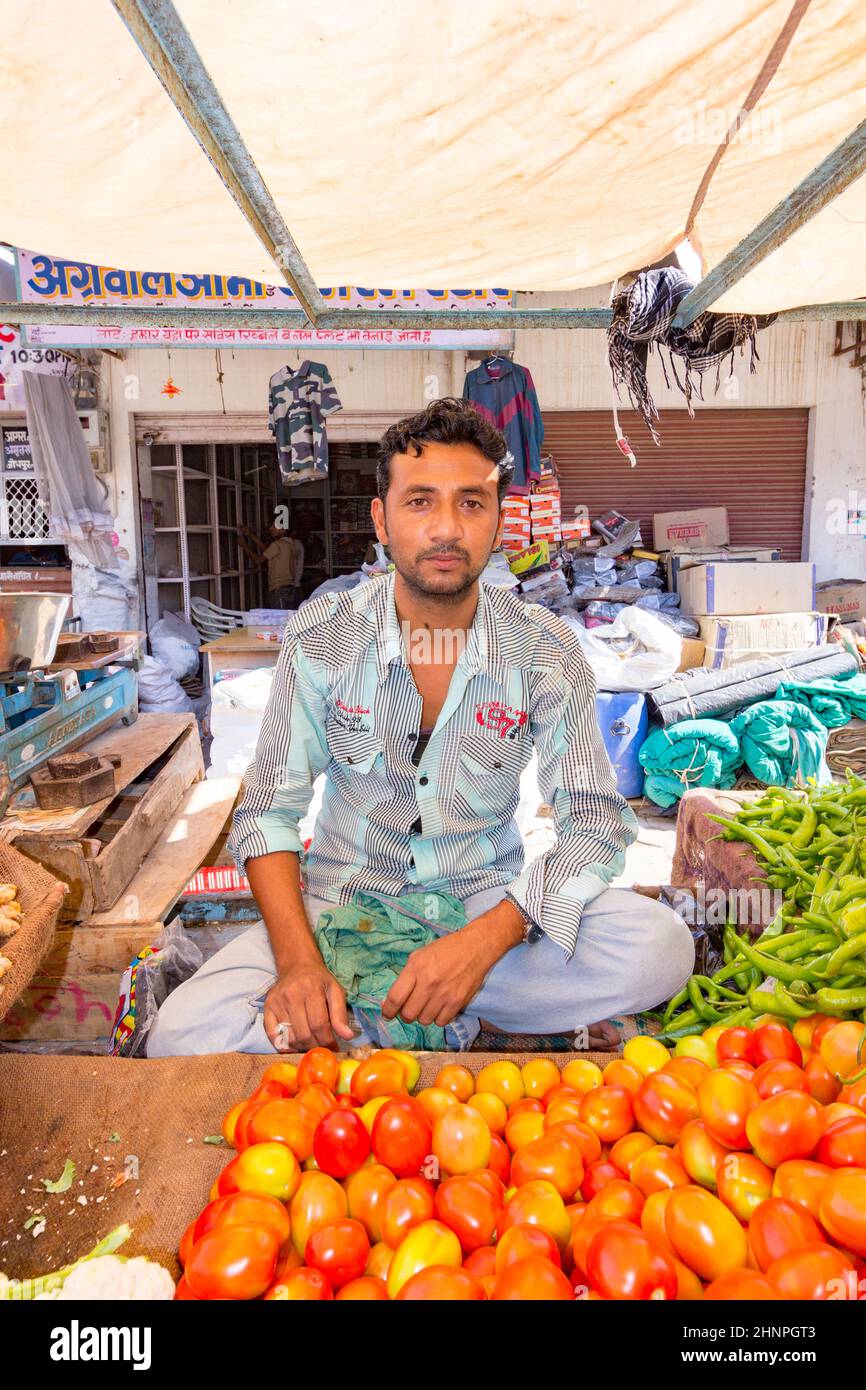 people sell their fresh fruits and vegetables at the outdoor market in ...