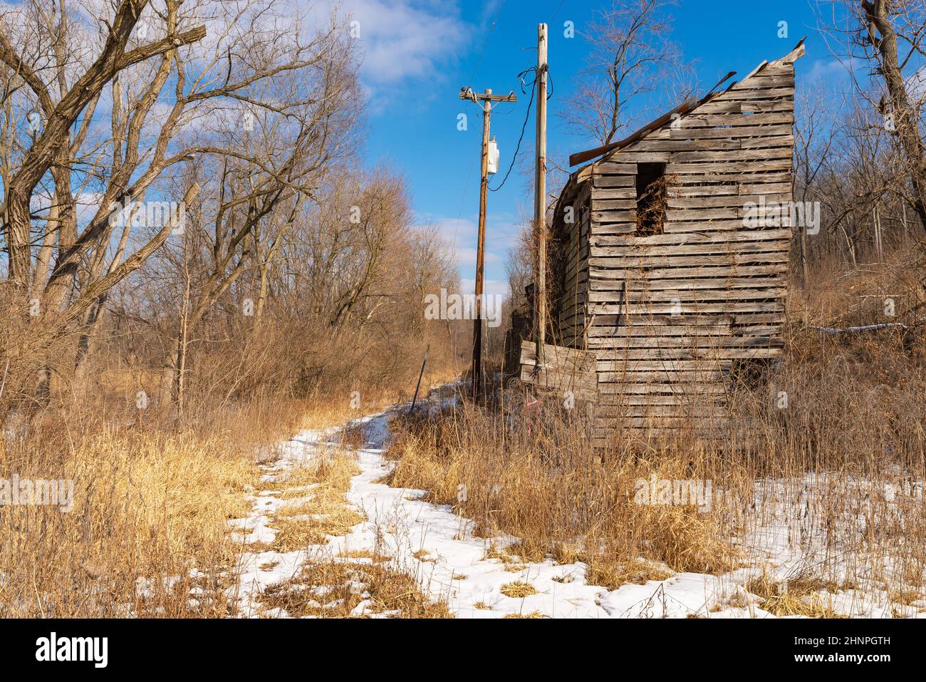 Old wooden structure in the woods on a beautiful Winter afternoon Stock ...