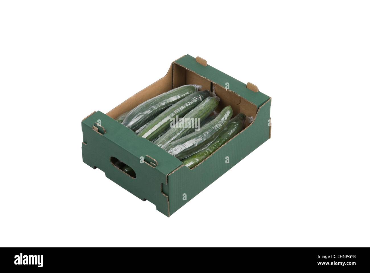 Box of fresh cucumbers isolated on white background Stock Photo - Alamy
