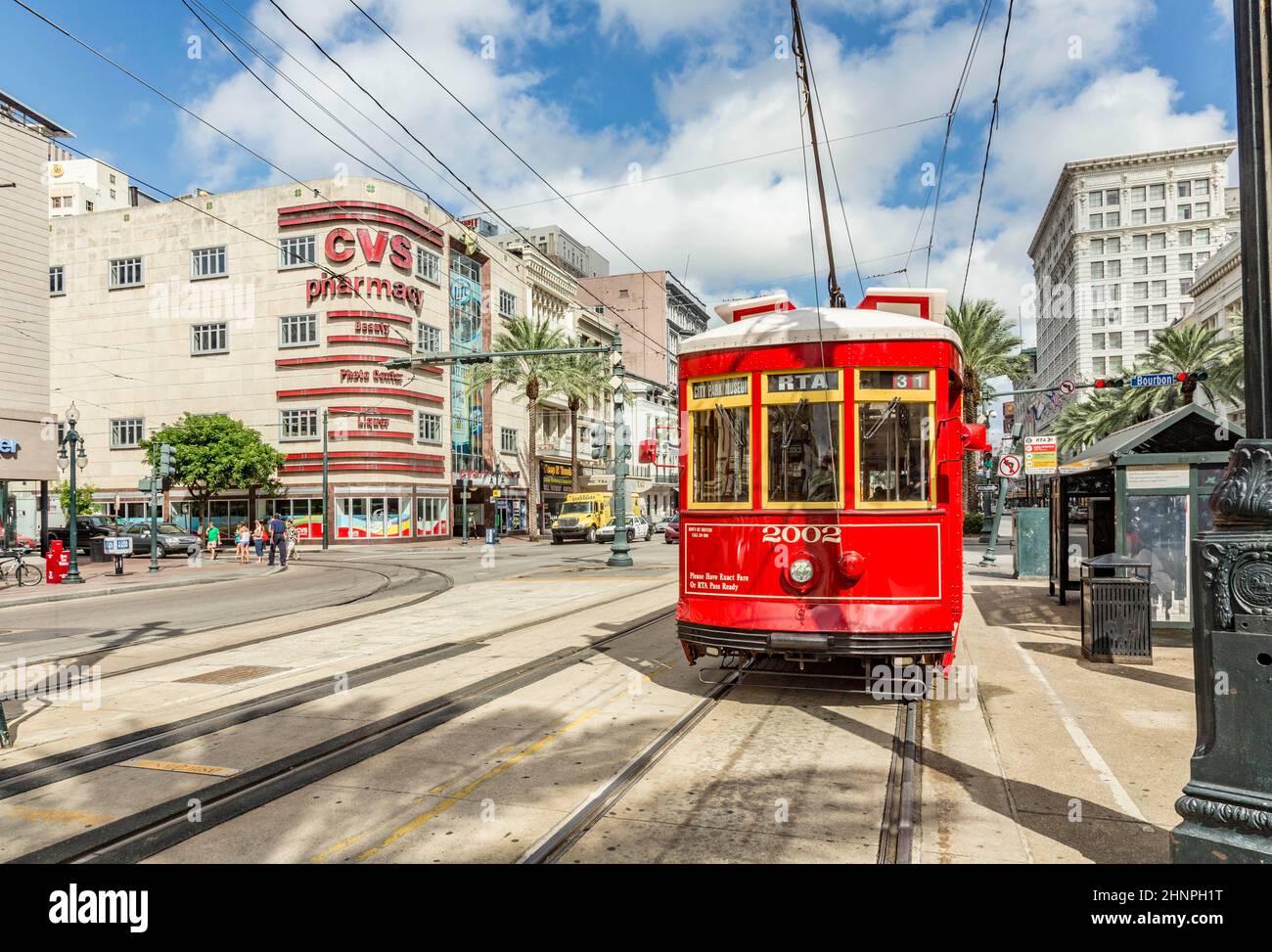 red trolley streetcar on rail in New Orleans French Quarter Stock Photo ...