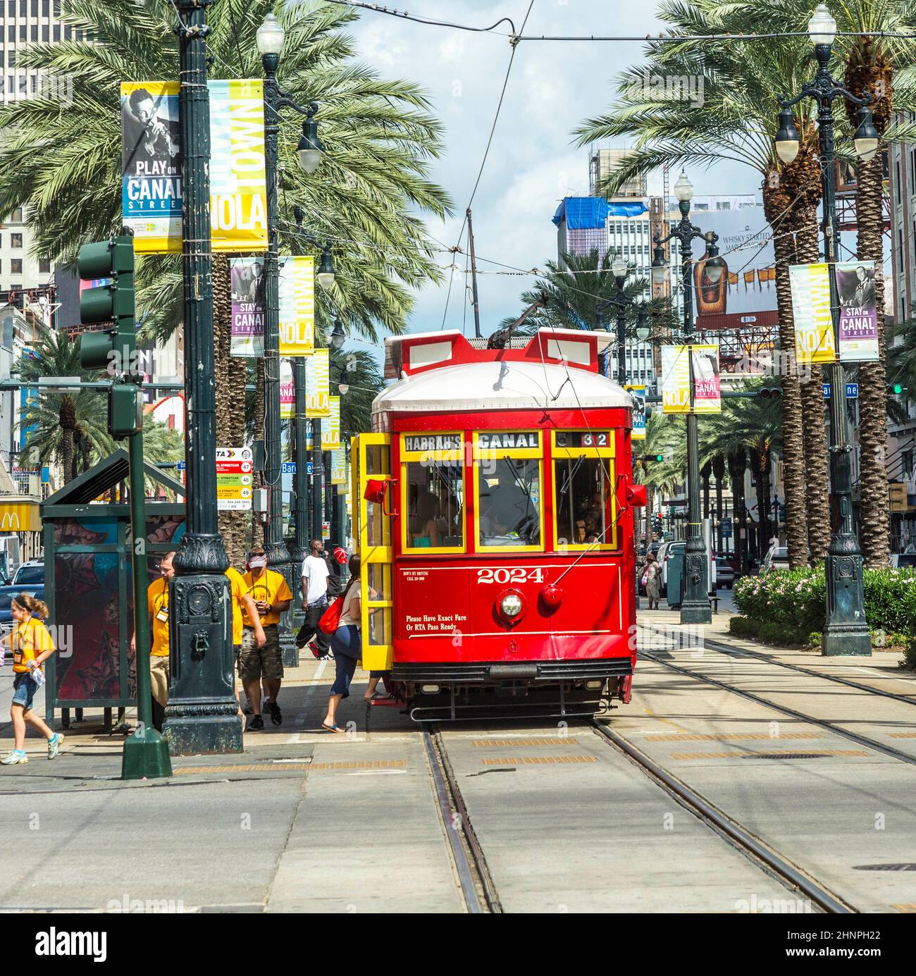 red trolley streetcar on rail in New Orleans French Quarter Stock Photo ...
