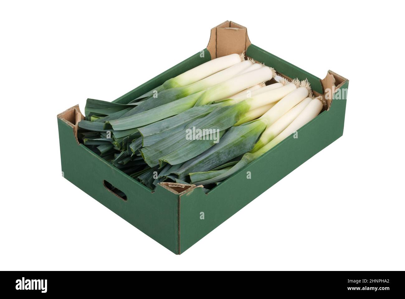 Box of fresh leeks isolated on white background Stock Photo - Alamy