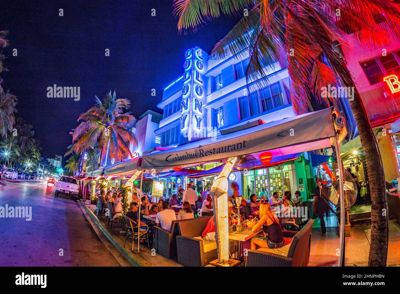people enjoy the evening in the Columbus restaurant next to famous art ...