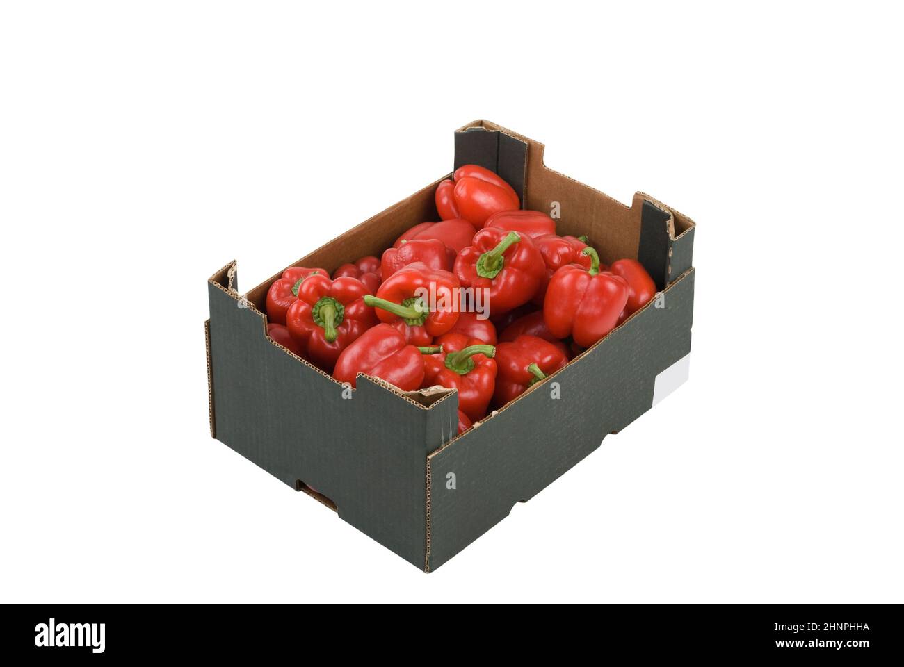 Box of fresh red peppers isolated on white background Stock Photo - Alamy