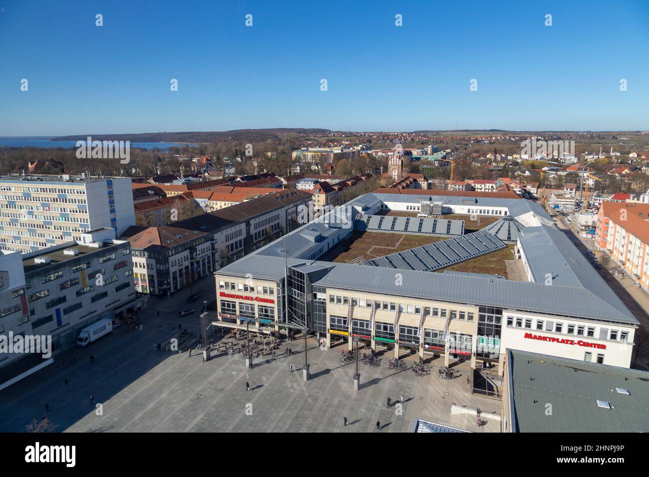 central market place with socialistic art buildings in Neubrandenburg ...