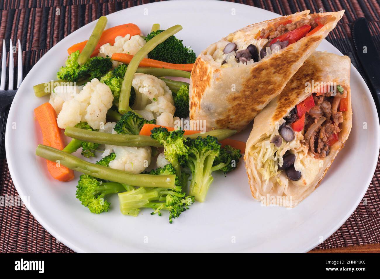 DELICIOUS VEGETARIAN FOOD WITH VEGETABLES, TORTILLAS, CARROT, CUCUMBERS ...