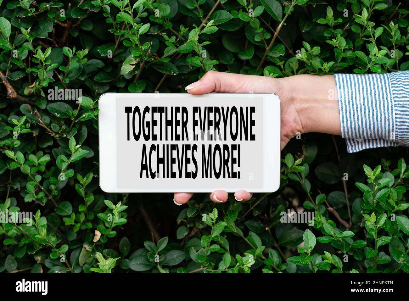 Sign displaying Together Everyone Achieves More, Business idea Members ...