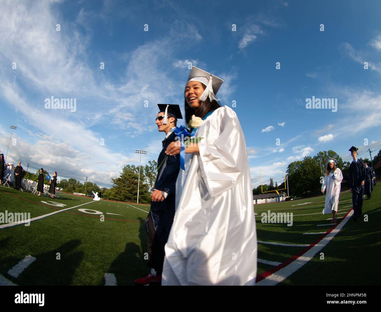 Graduation cap throwing hands hi-res stock photography and images - Alamy