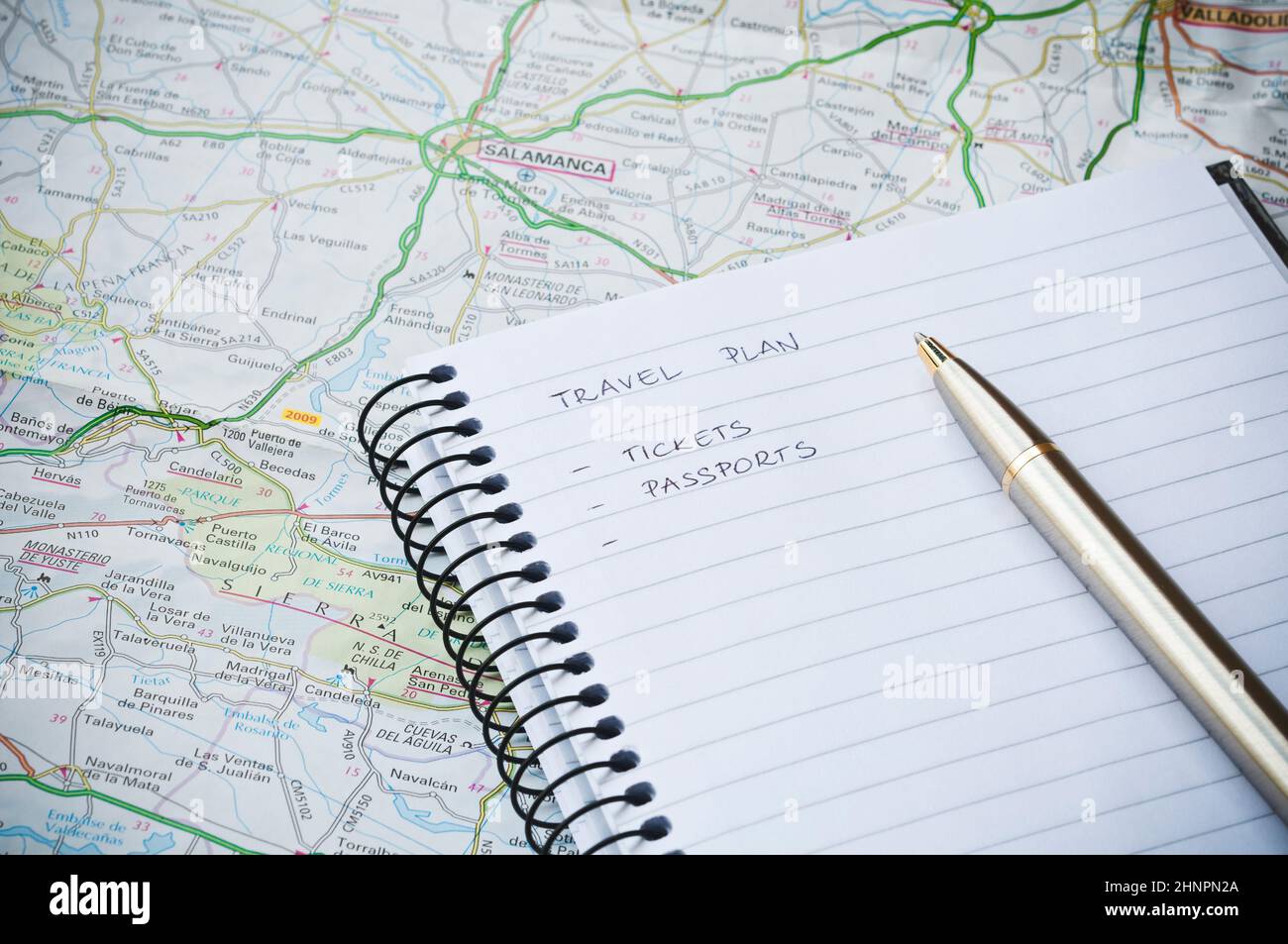 Travel plan concept with notebook, writing, map and ballpoint pen Stock ...