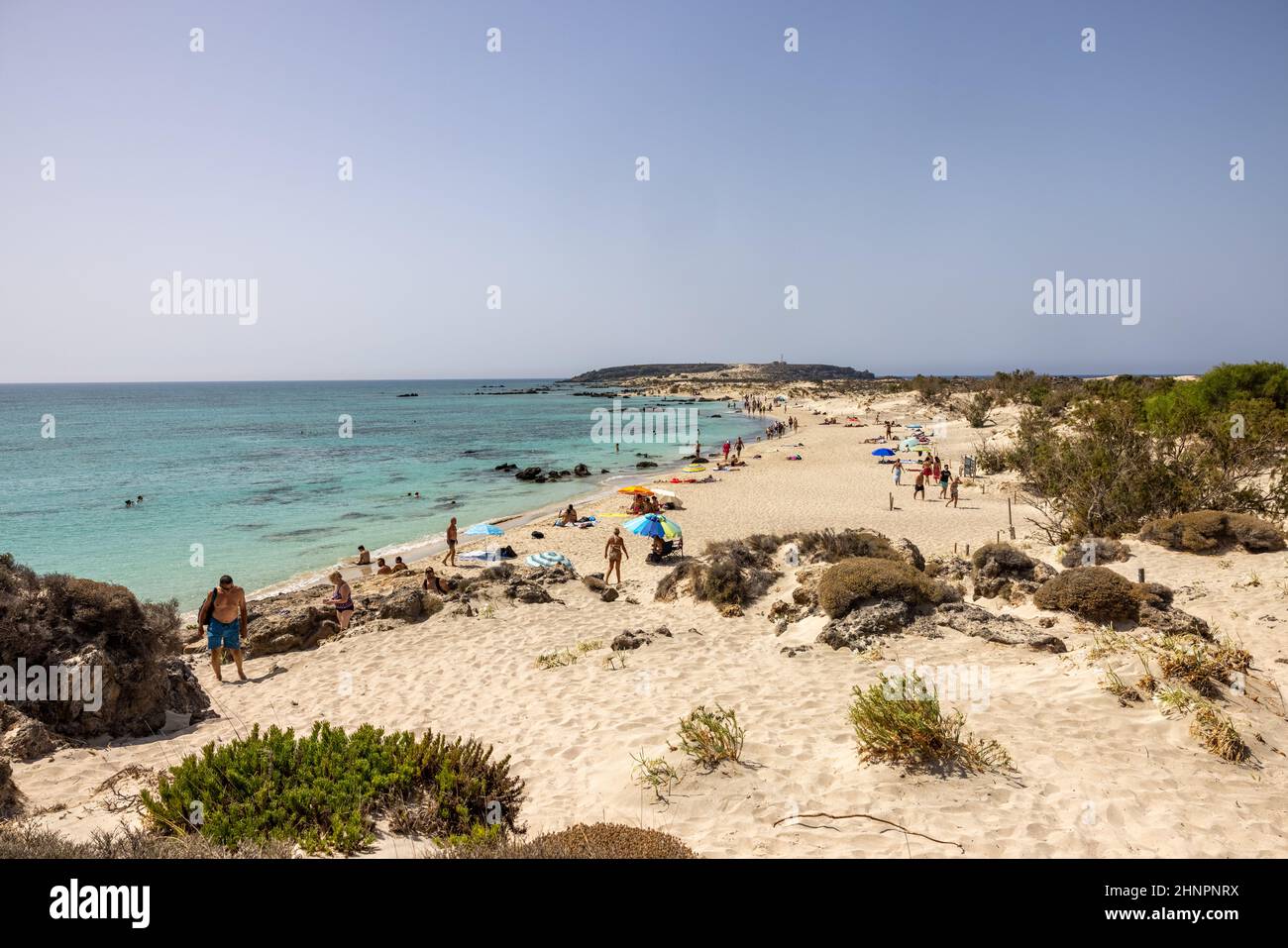 People relaxing on the famous pink coral beach of Elafonisi on Crete ...