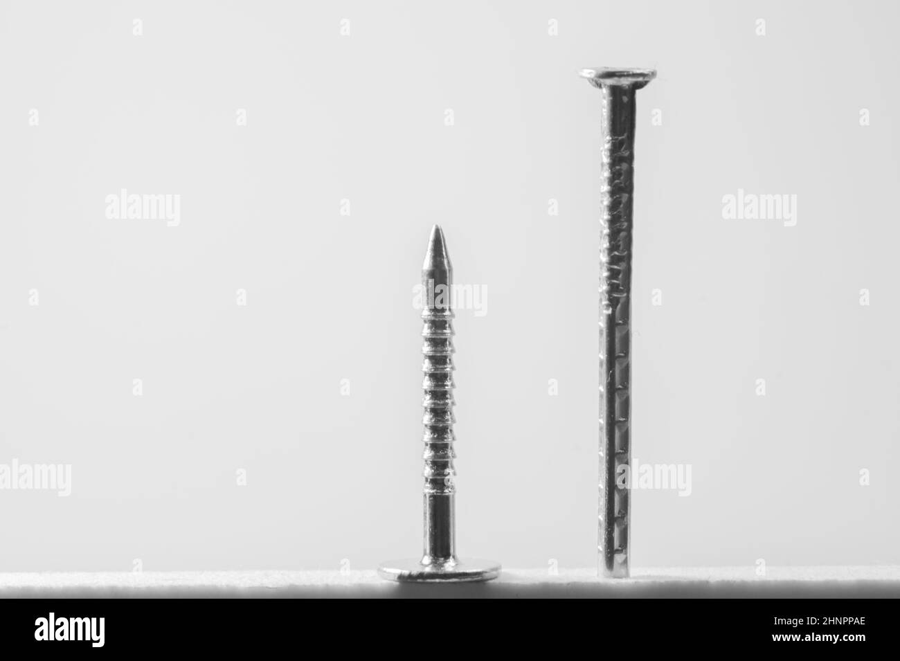 Metal nail isolated on white background Stock Photo - Alamy