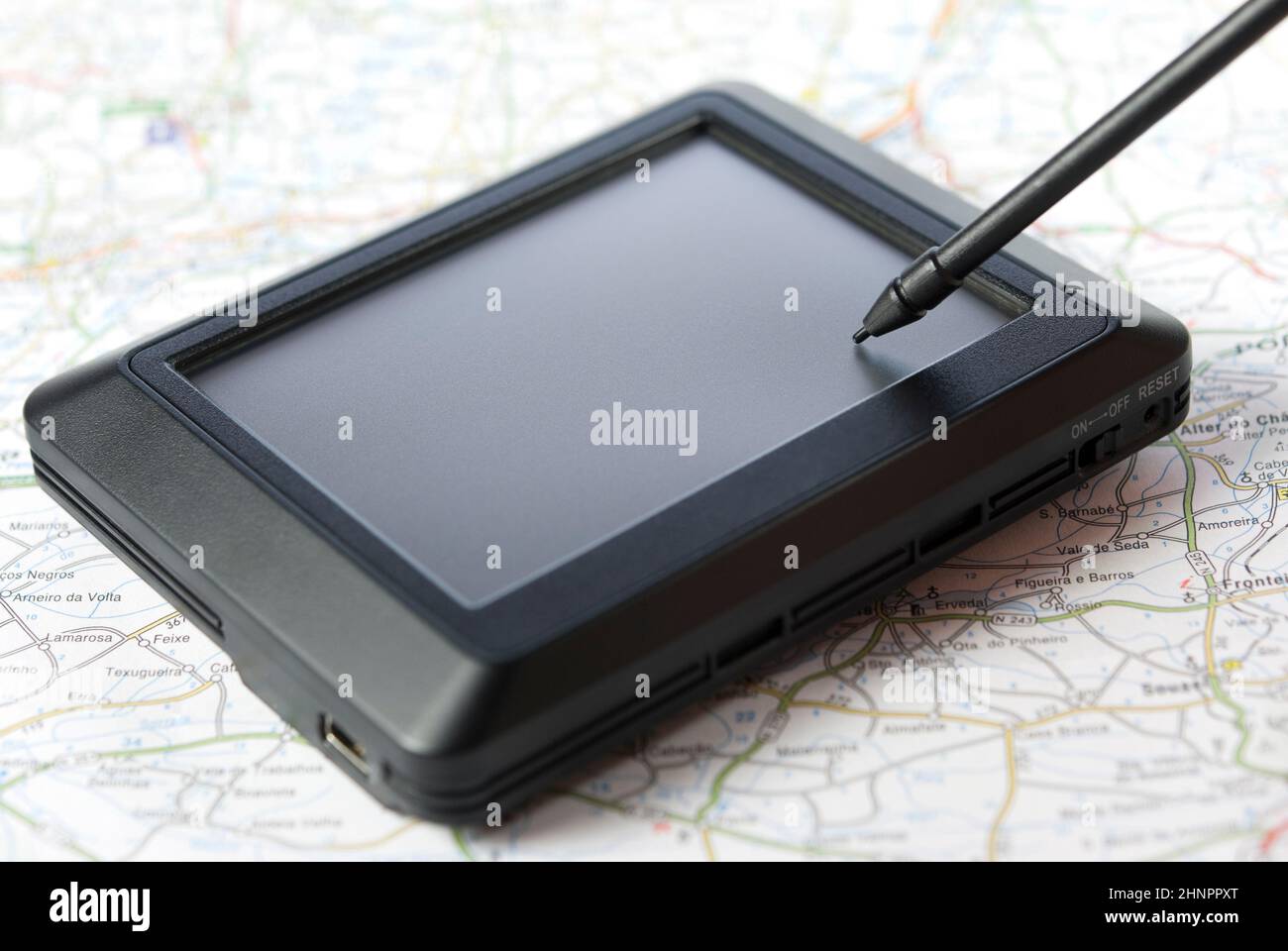 GPS global positioning device arranged with map and stylus pen Stock ...