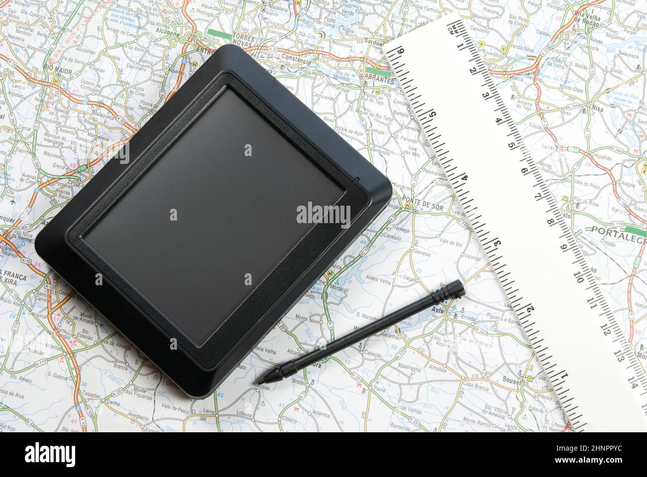 GPS global positioning device with stylus pen and ruler arranged with ...