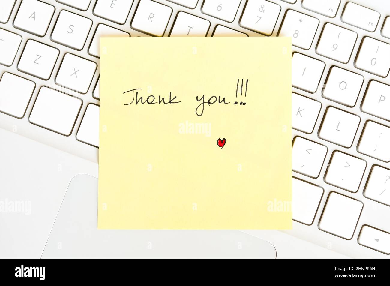 Postit note saying Thank You arranged on a laptop keyboard Stock Photo ...