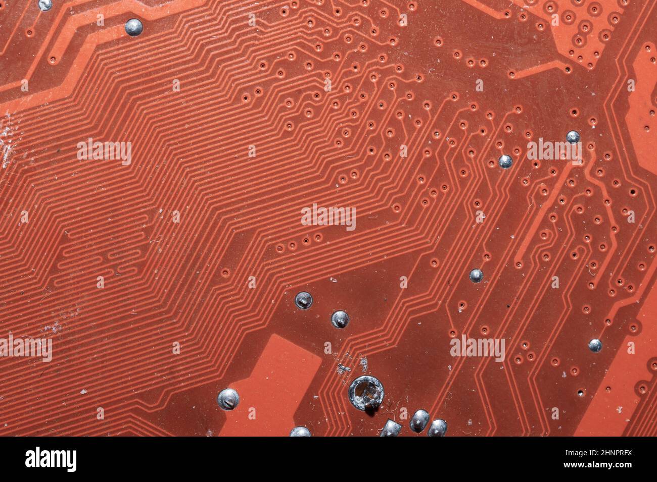 Spoiled motherboard close up. circuit board with dust and defects ...