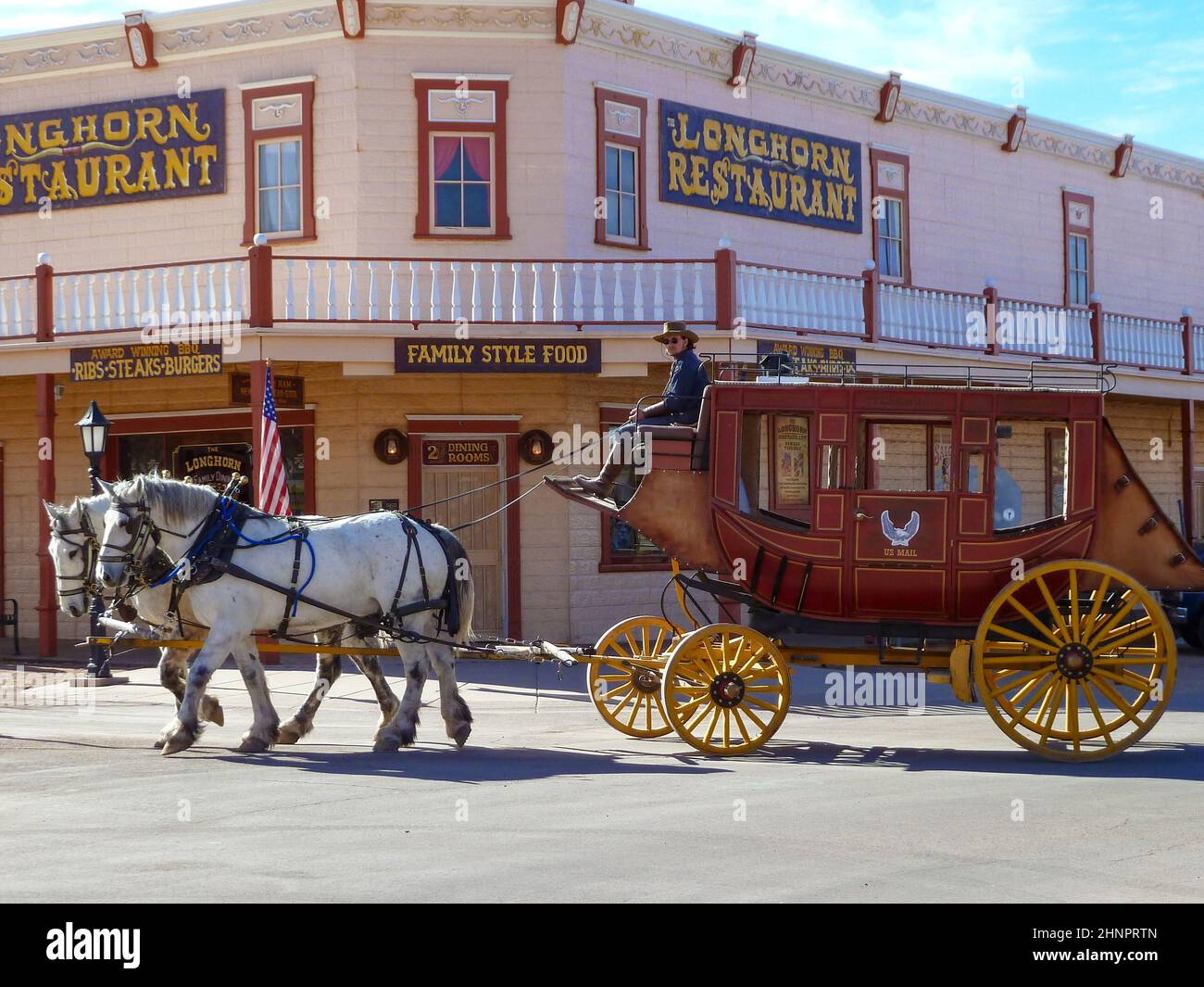 Historic Allen street with a horse drawn stagecoach in Tombstone Stock ...