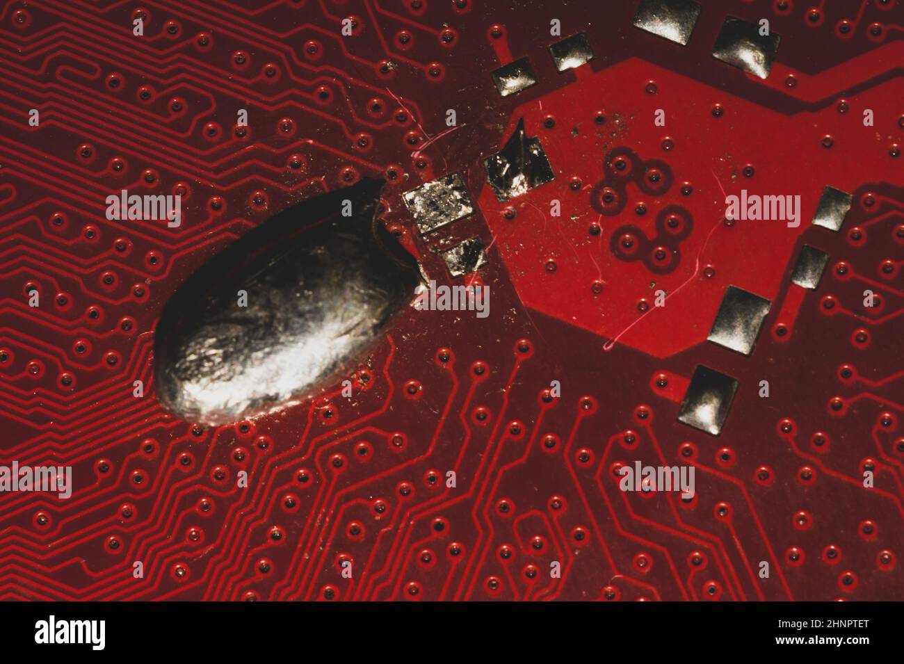 Spoiled motherboard close up. circuit board with dust and defects ...