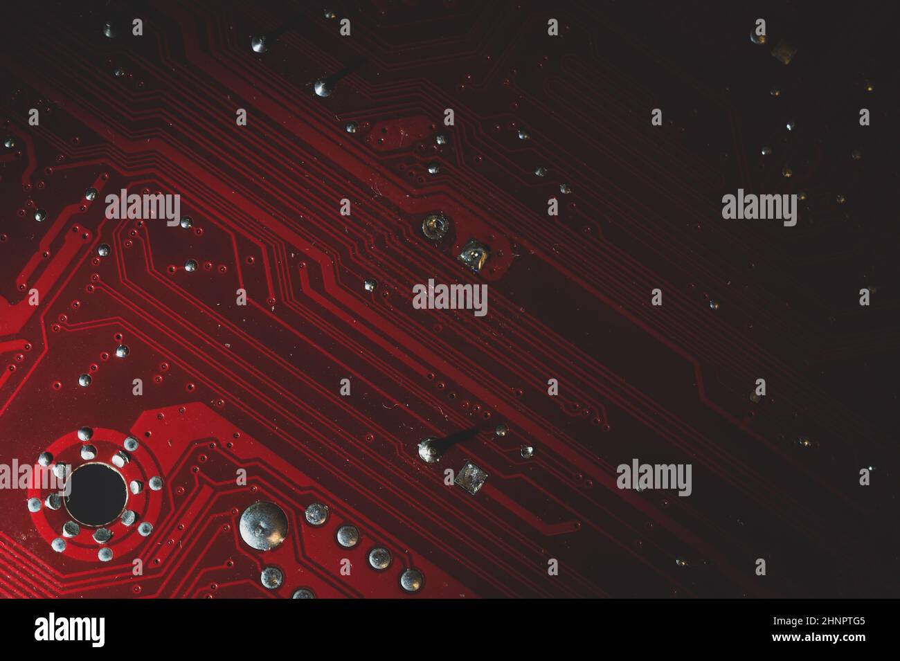 Dusty motherboard close up. circuit board with dust and defects. modern technologies. micro ...