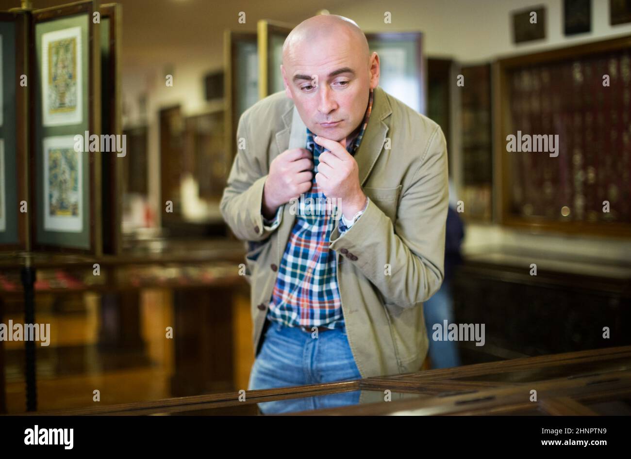 man is visiting museum Stock Photo - Alamy