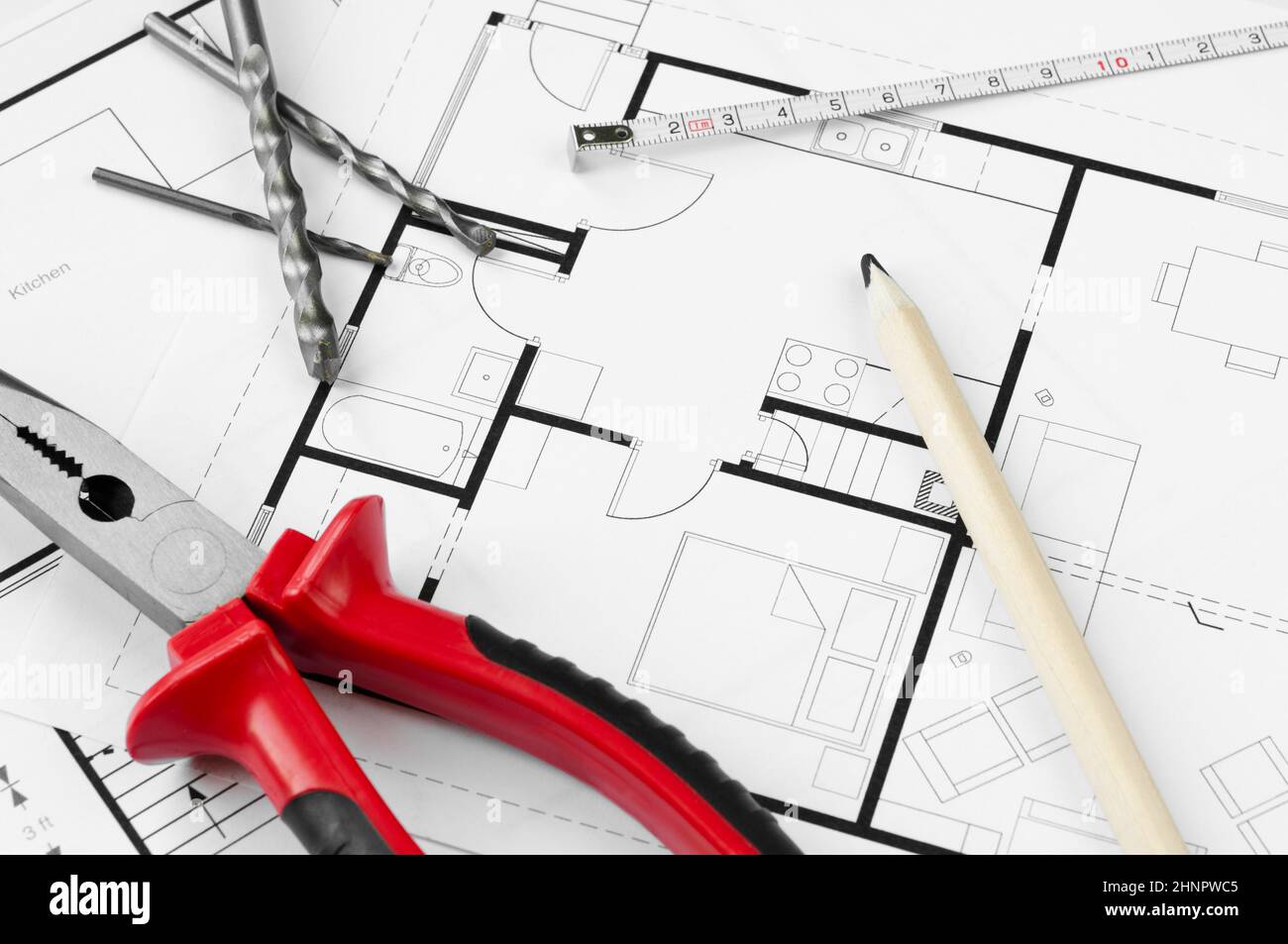 Building plan with selection of construction tools Stock Photo - Alamy