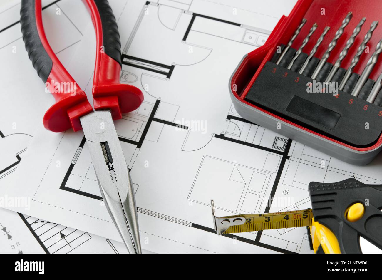 Building plan with selection of construction tools Stock Photo - Alamy