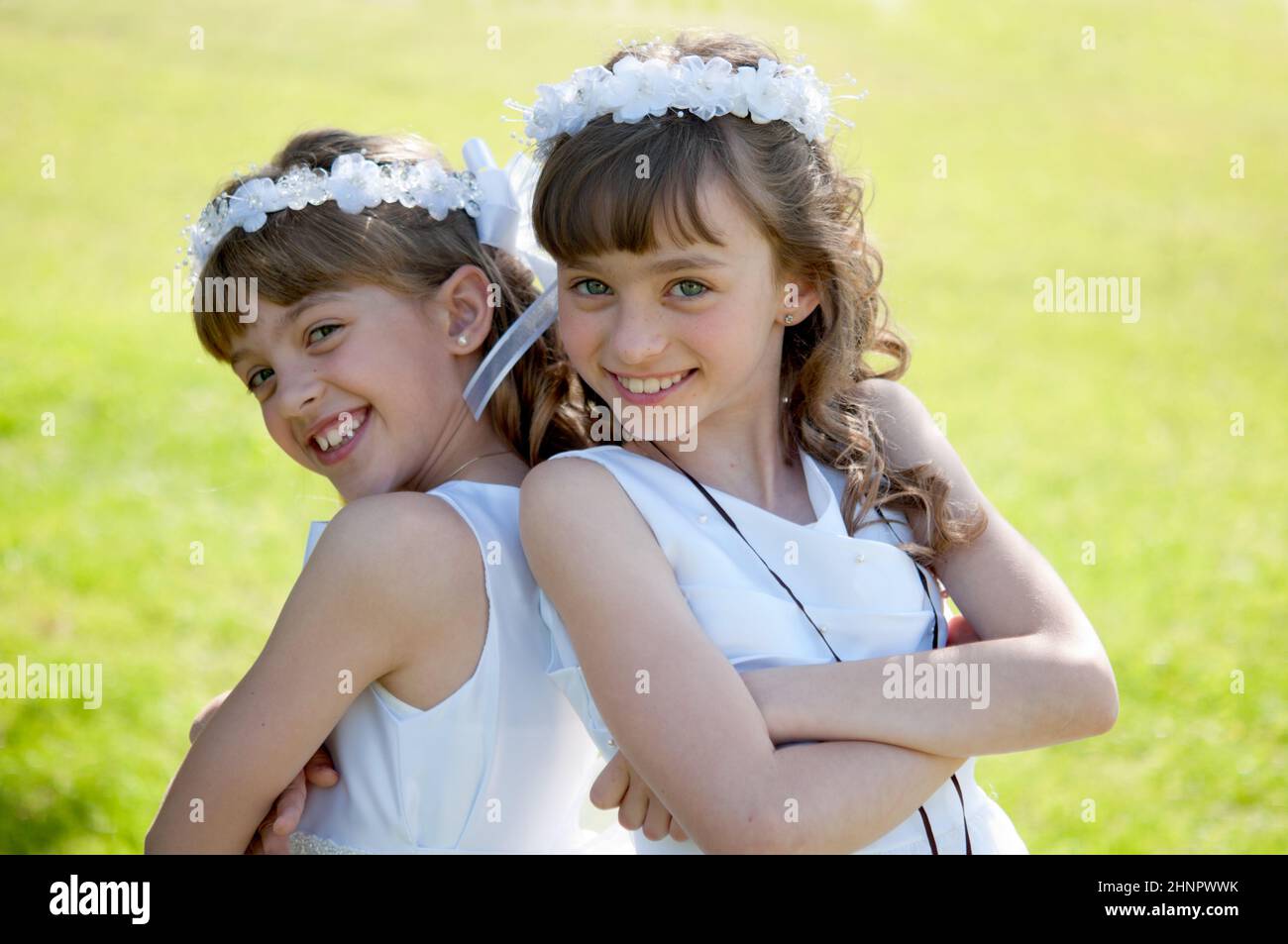 Young girls doing her catholic first holy communion Stock Photo - Alamy