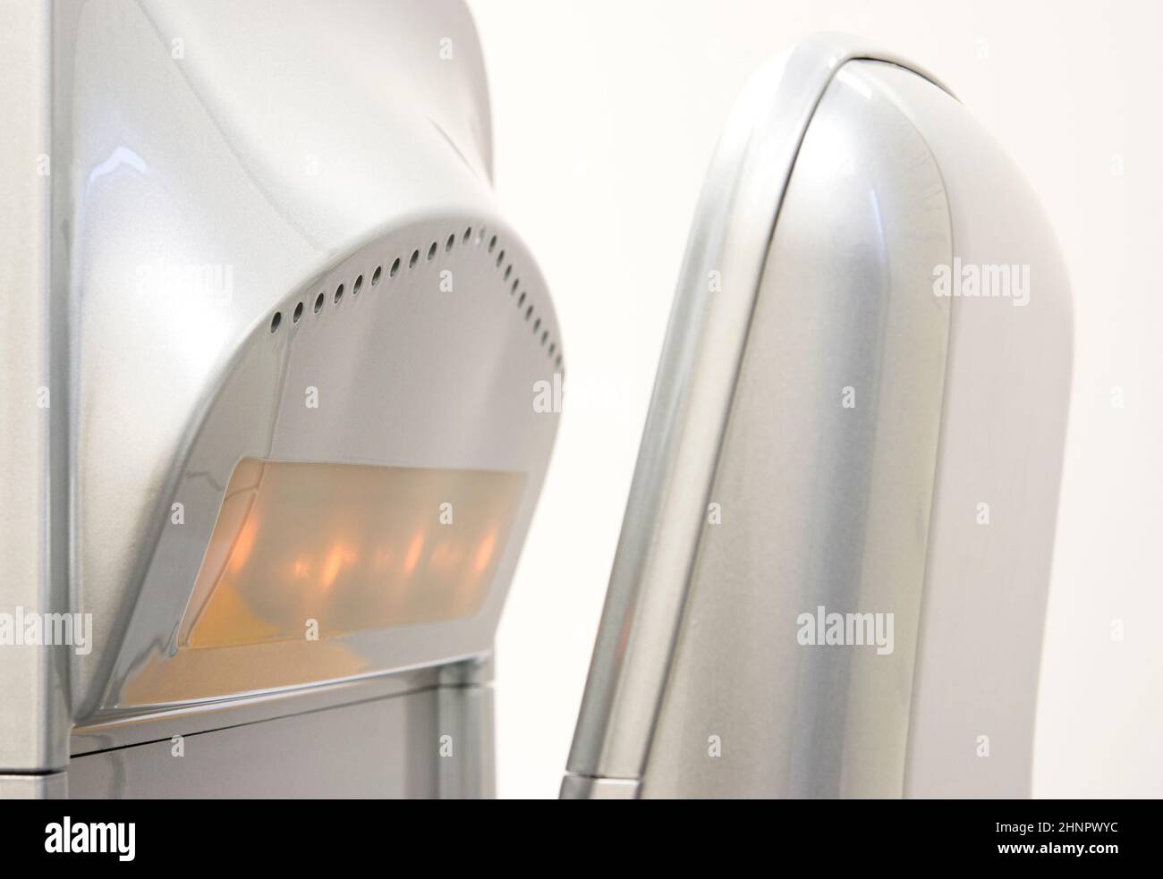 Vertical towel hand dryer close up Stock Photo - Alamy