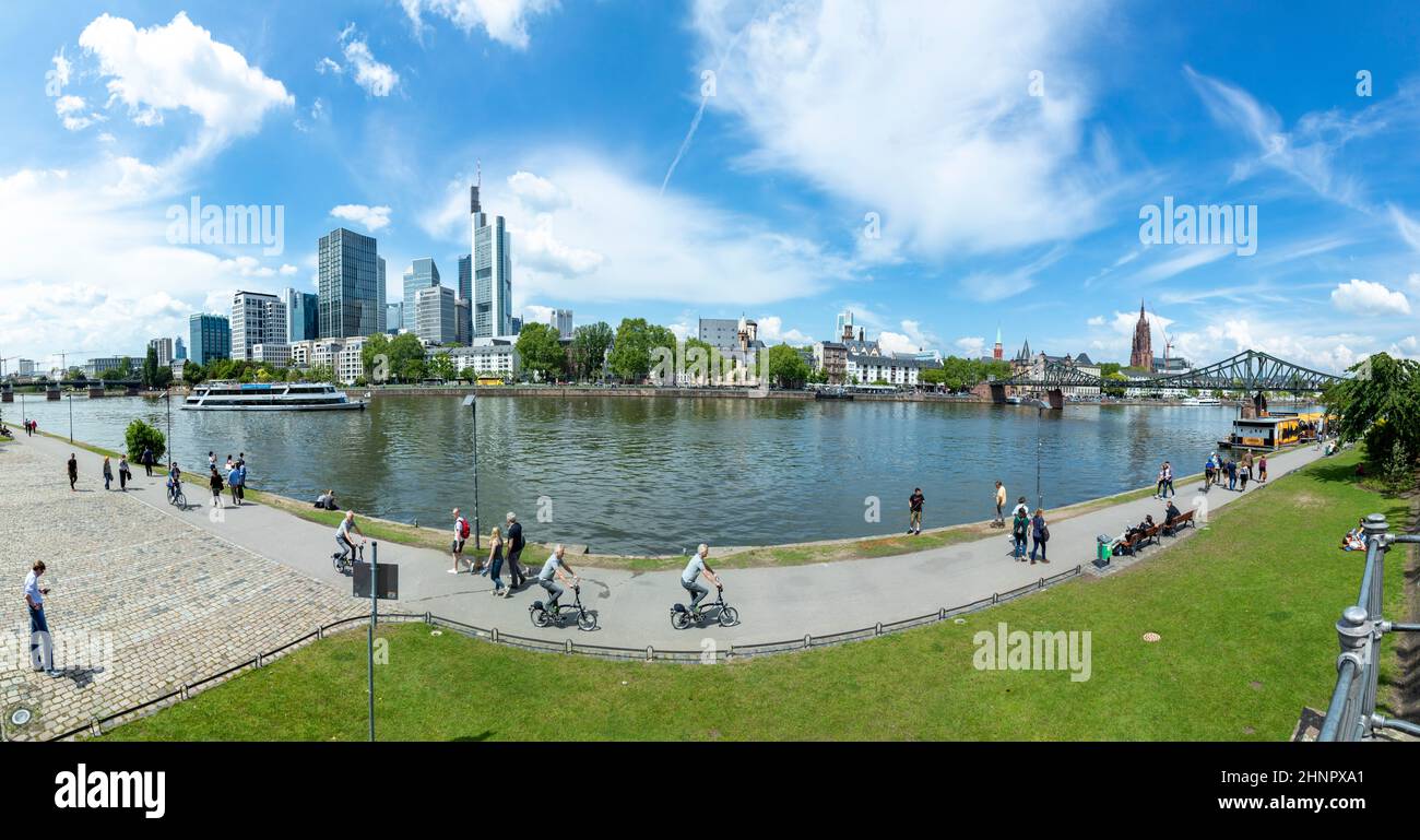 panoramic view of Frankfurt with river Main and people enjoying to ...