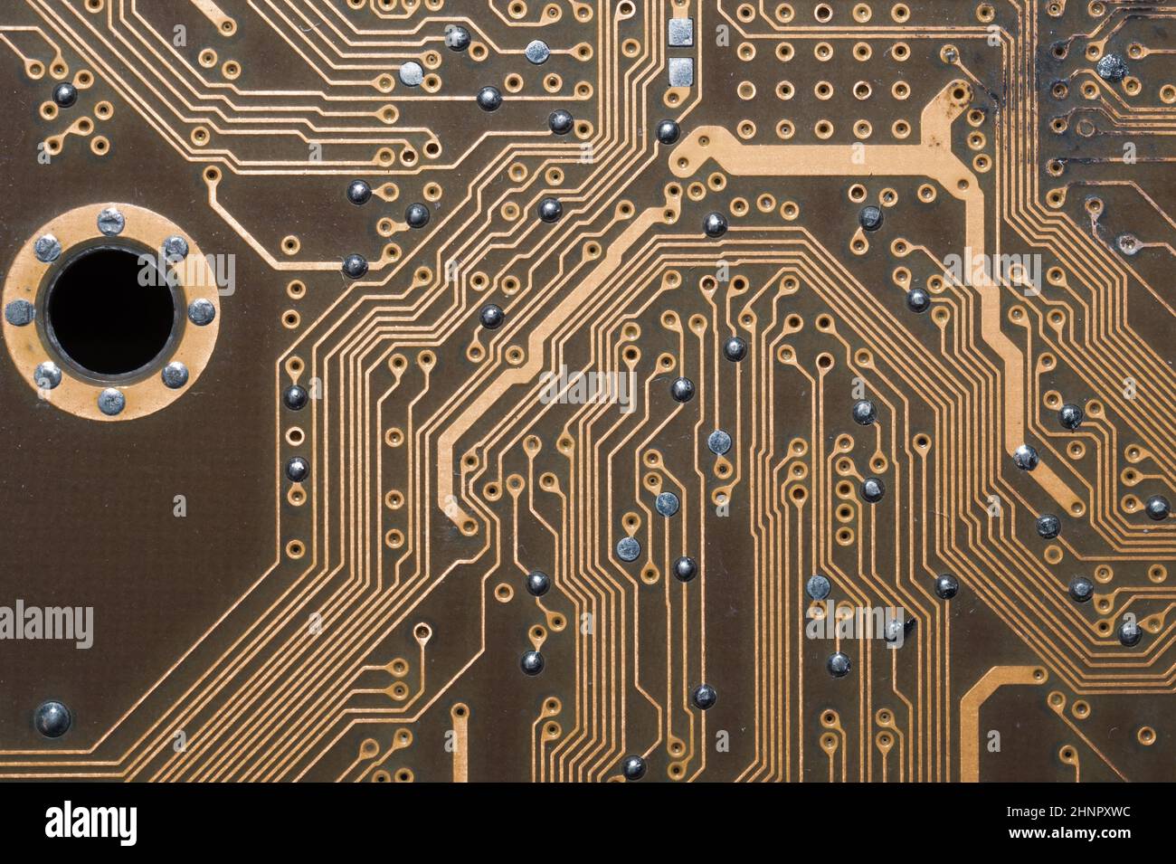 Burnt circuit board abstract background. spoiled motherboard close up ...