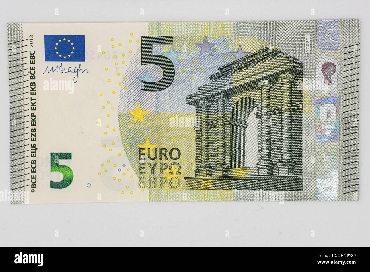 A new five euro banknote on a white background Stock Photo - Alamy