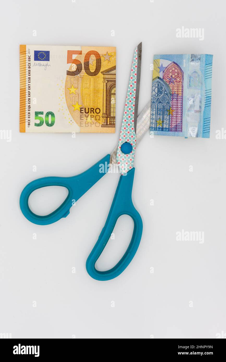 Devaluation of a 50 euro banknote to a 20 euro banknote Stock Photo - Alamy