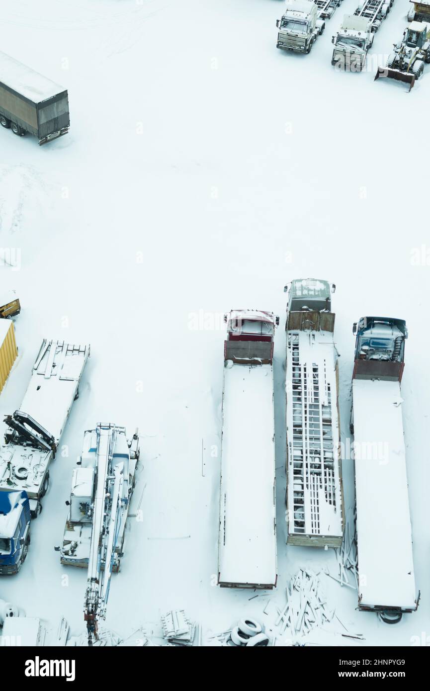 Truck under the snow. lorry covered with snow after snowfall. long ...