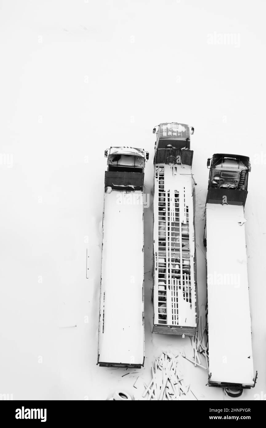 Truck under the snow. lorry covered with snow after snowfall. long ...