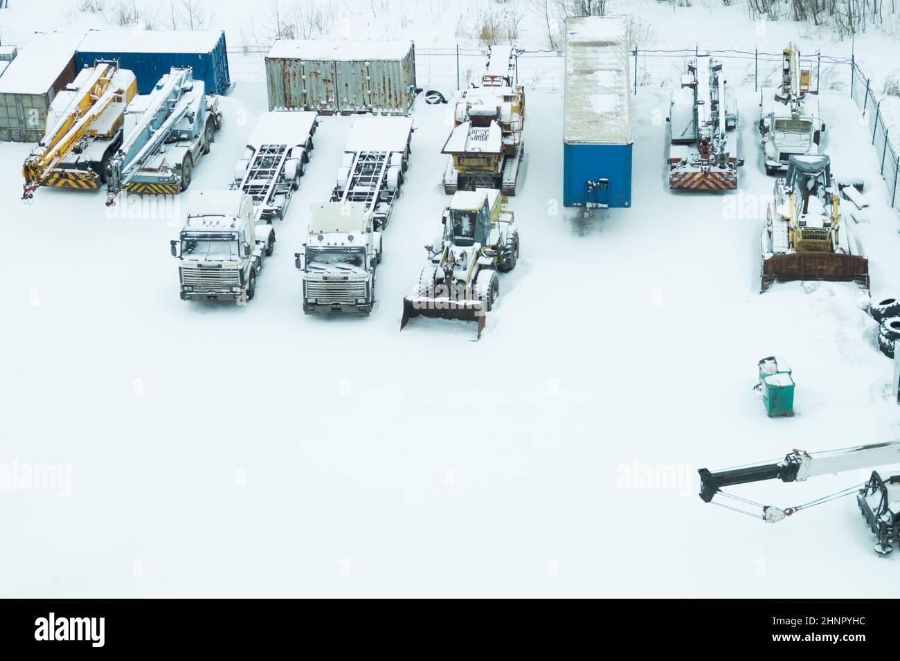 Truck under the snow. lorry covered with snow after snowfall. long ...