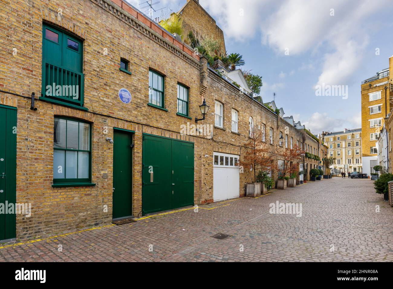 Cobbled street and Victorian houses in Reece Mews in South Kensington ...