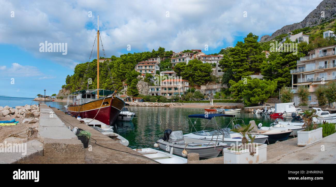 Small harbor with fishing boats in Brela on the Markarska Riviera in ...