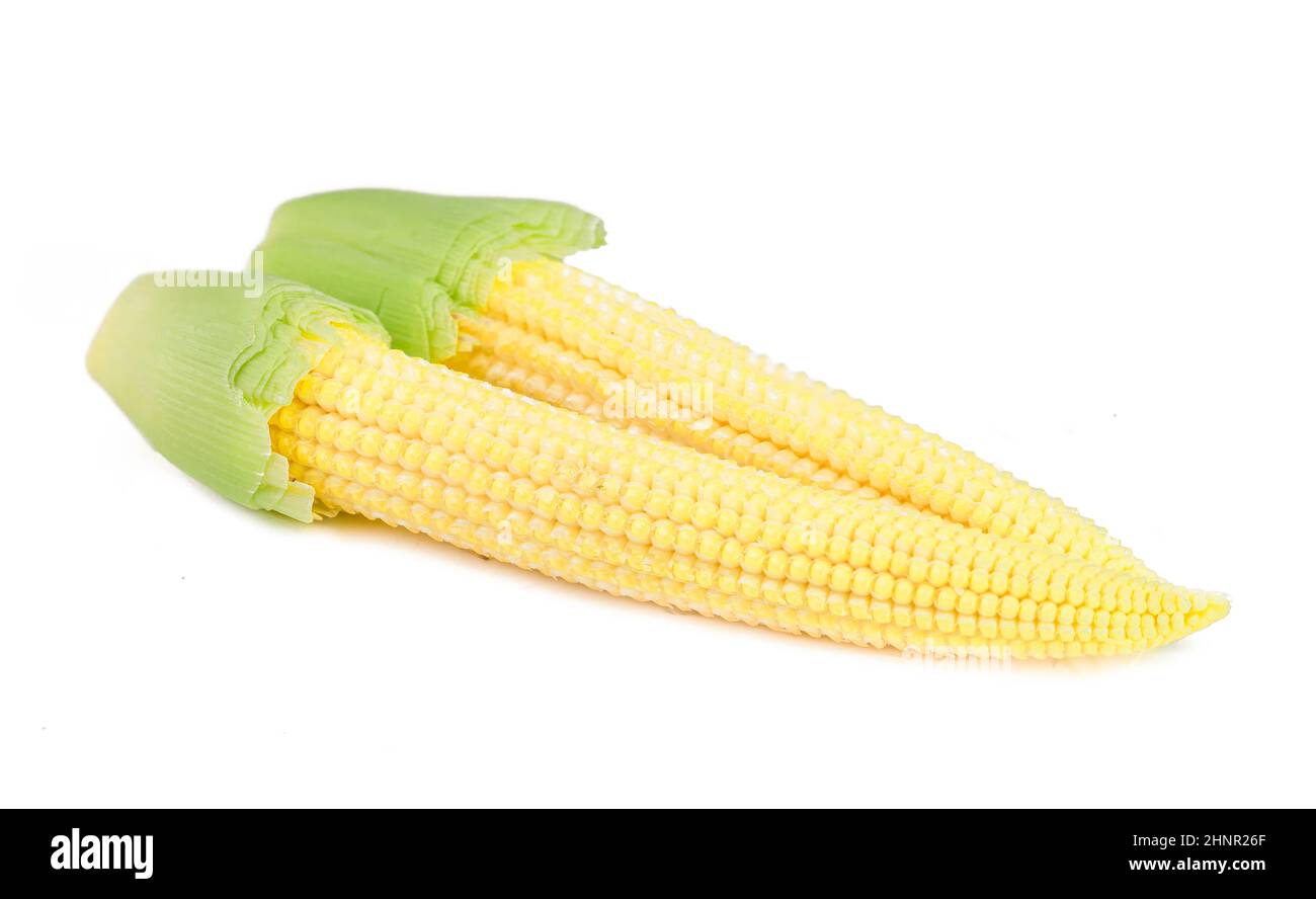 Baby sweet corn isolated on white background Stock Photo - Alamy