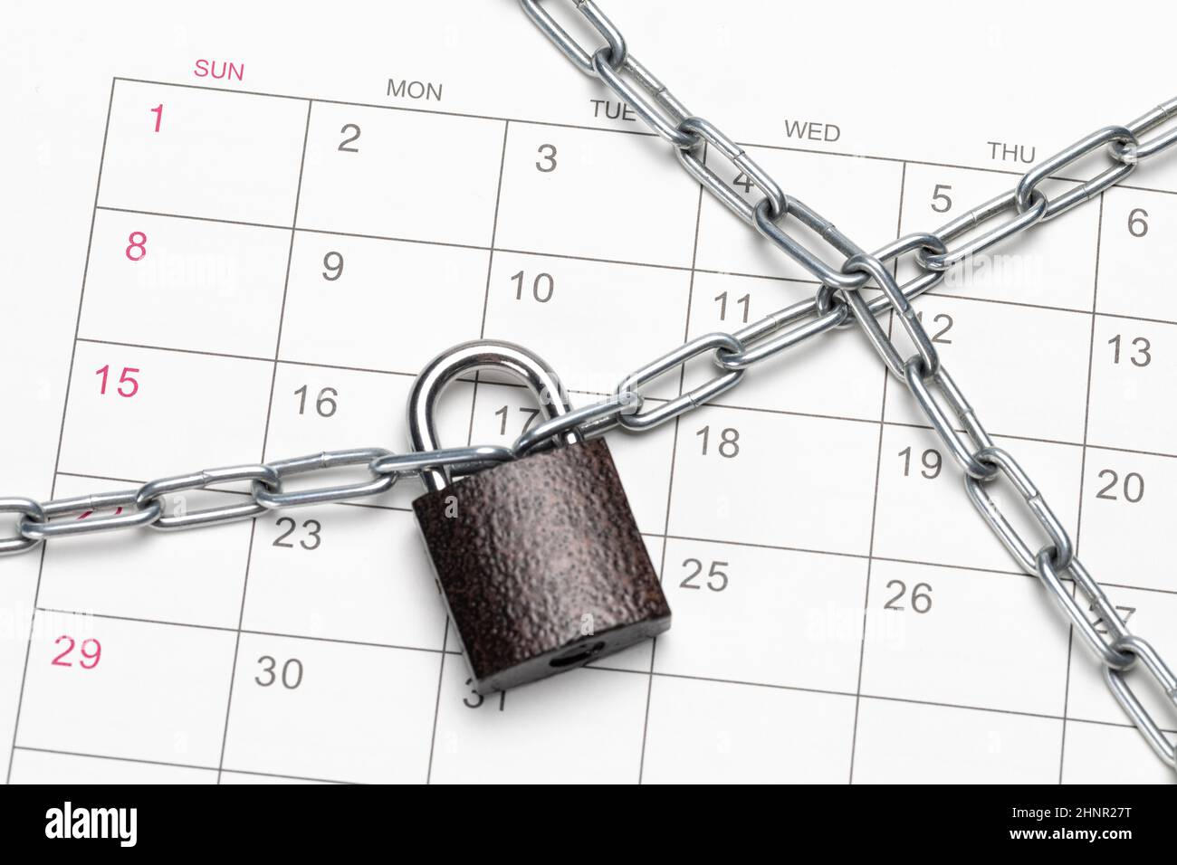 Calendar is wrapped in a chain and locked. Busy schedule or ban ...