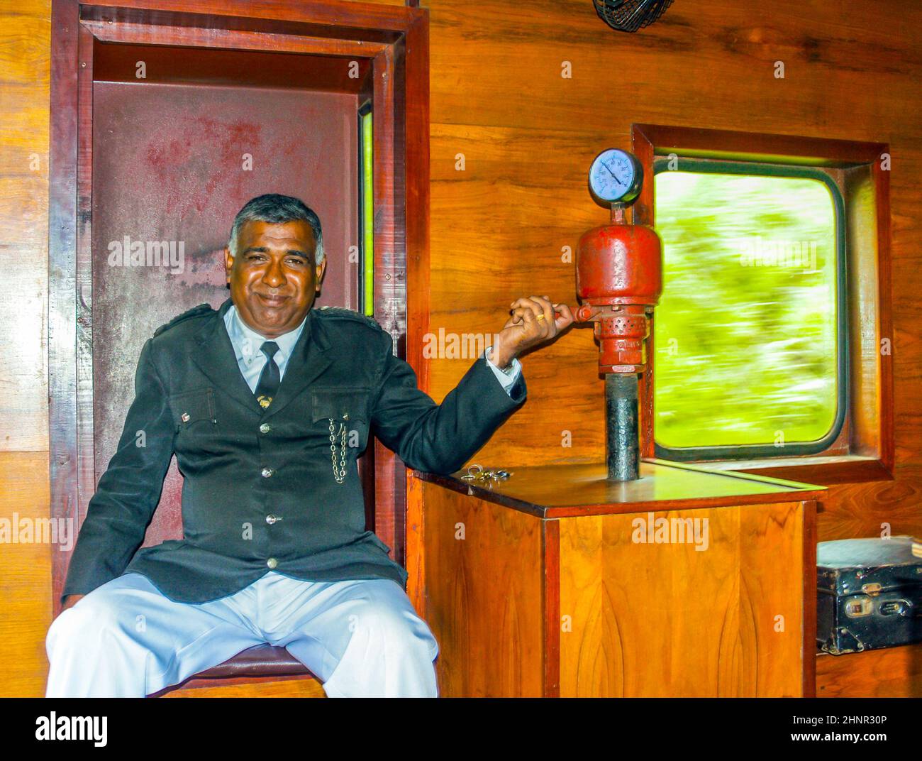 proud conductor in train Stock Photo - Alamy