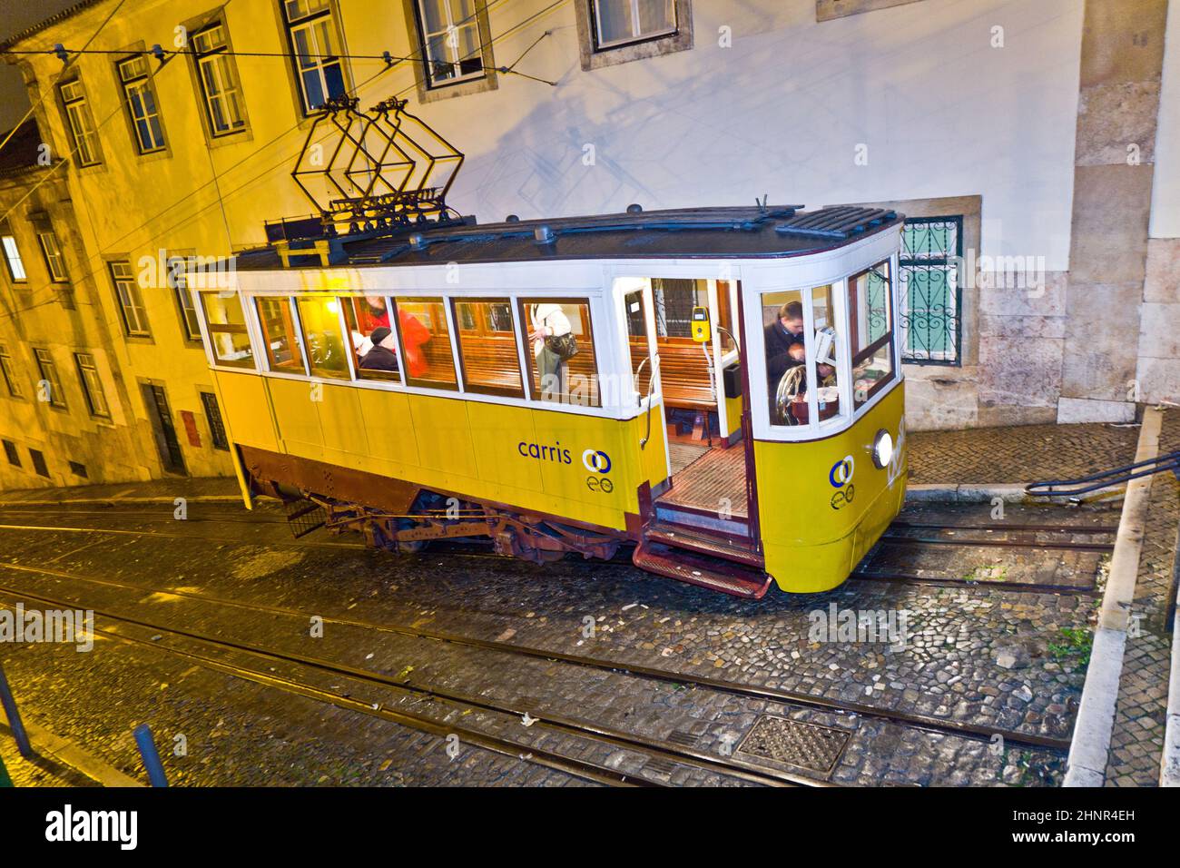 Lisbon at night, famous tram, historic streetcar is running Stock Photo ...