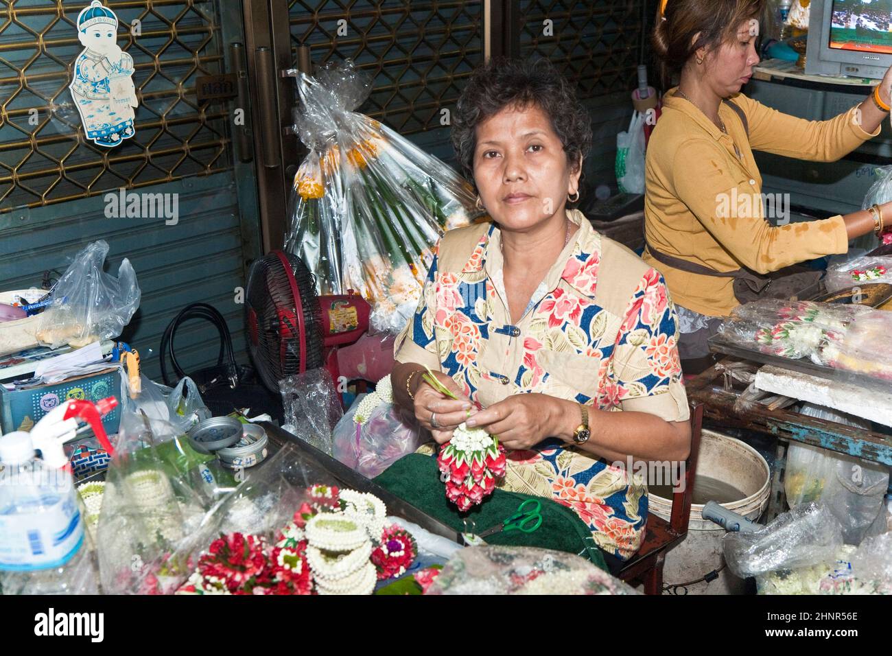 women are selling fresh flowers at the morning market Stock Photo - Alamy