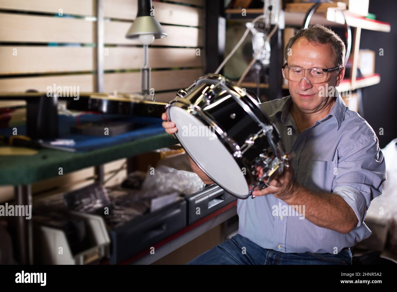 Repairing musical instruments hi-res stock photography and images - Alamy