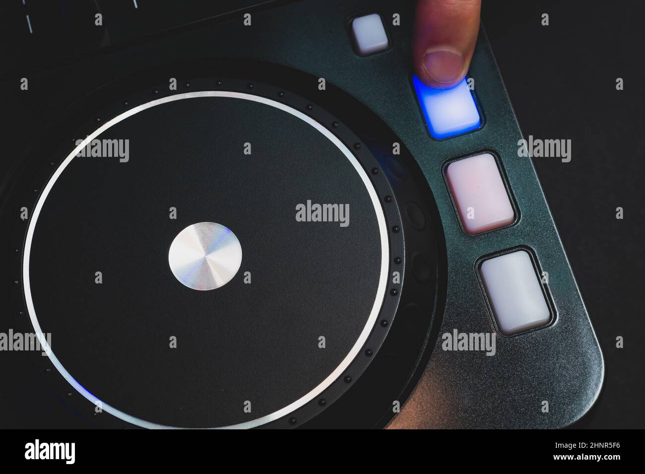 Dj sound mixer controller with knobs and sliders close up. audio mixing ...