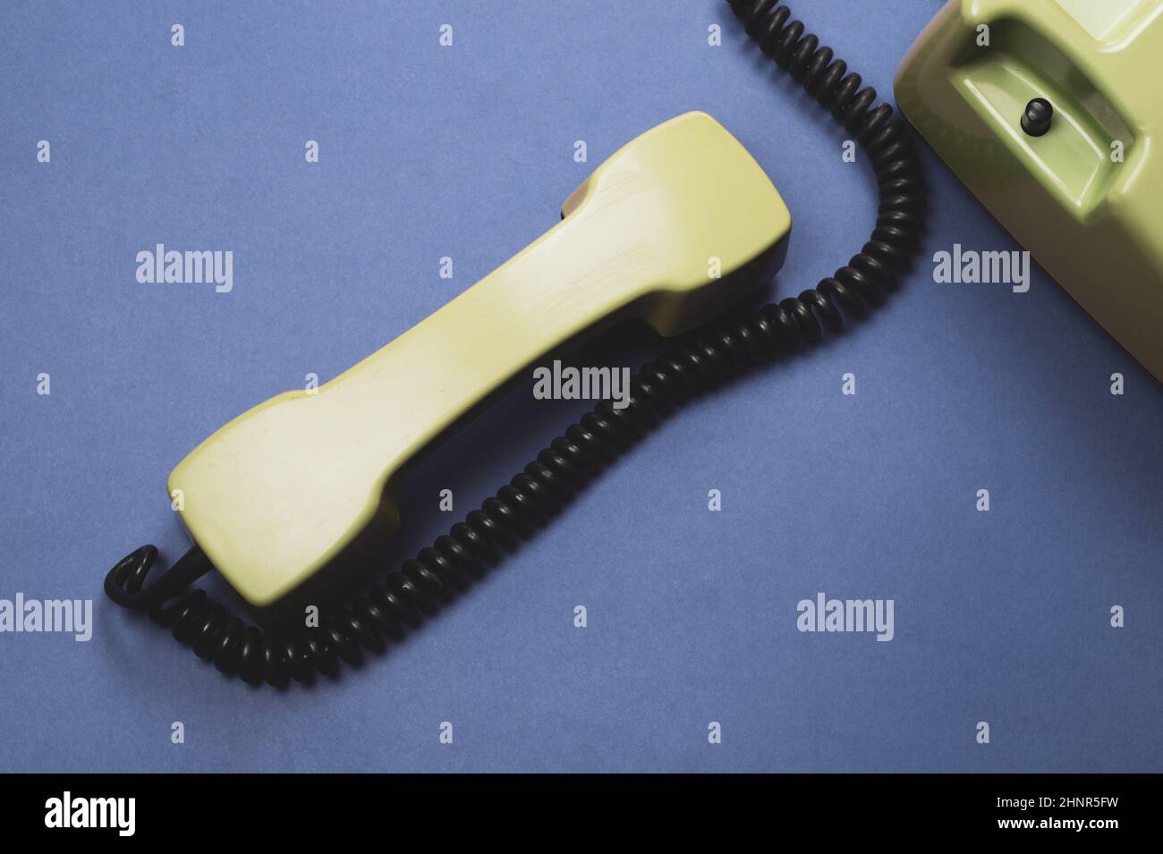 Telephone handset. phone receiver on blue background. old communication ...