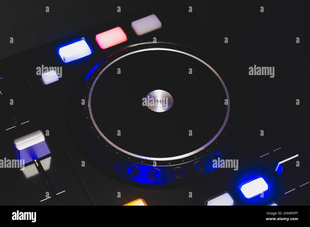 Dj sound mixer controller with knobs and sliders close up. audio mixing ...