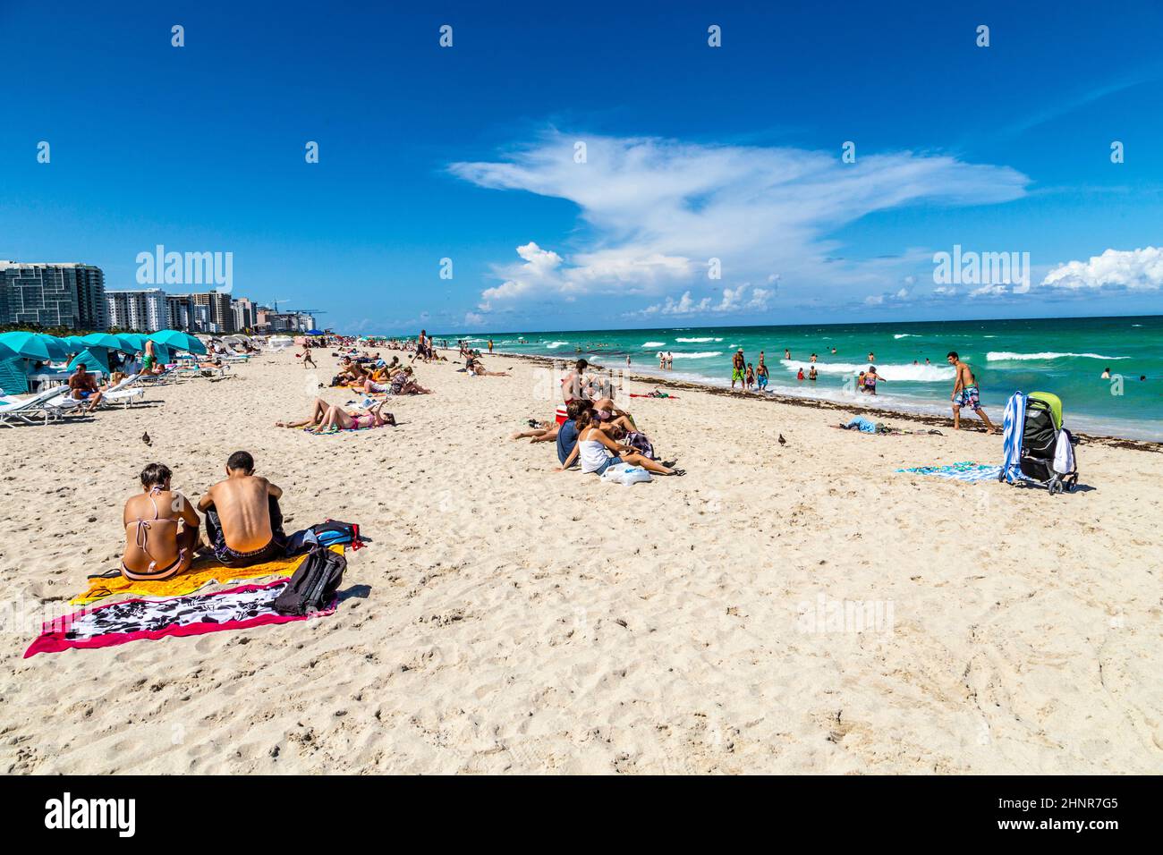 people enjoy the hot summer day at south beach in Miami Stock Photo - Alamy