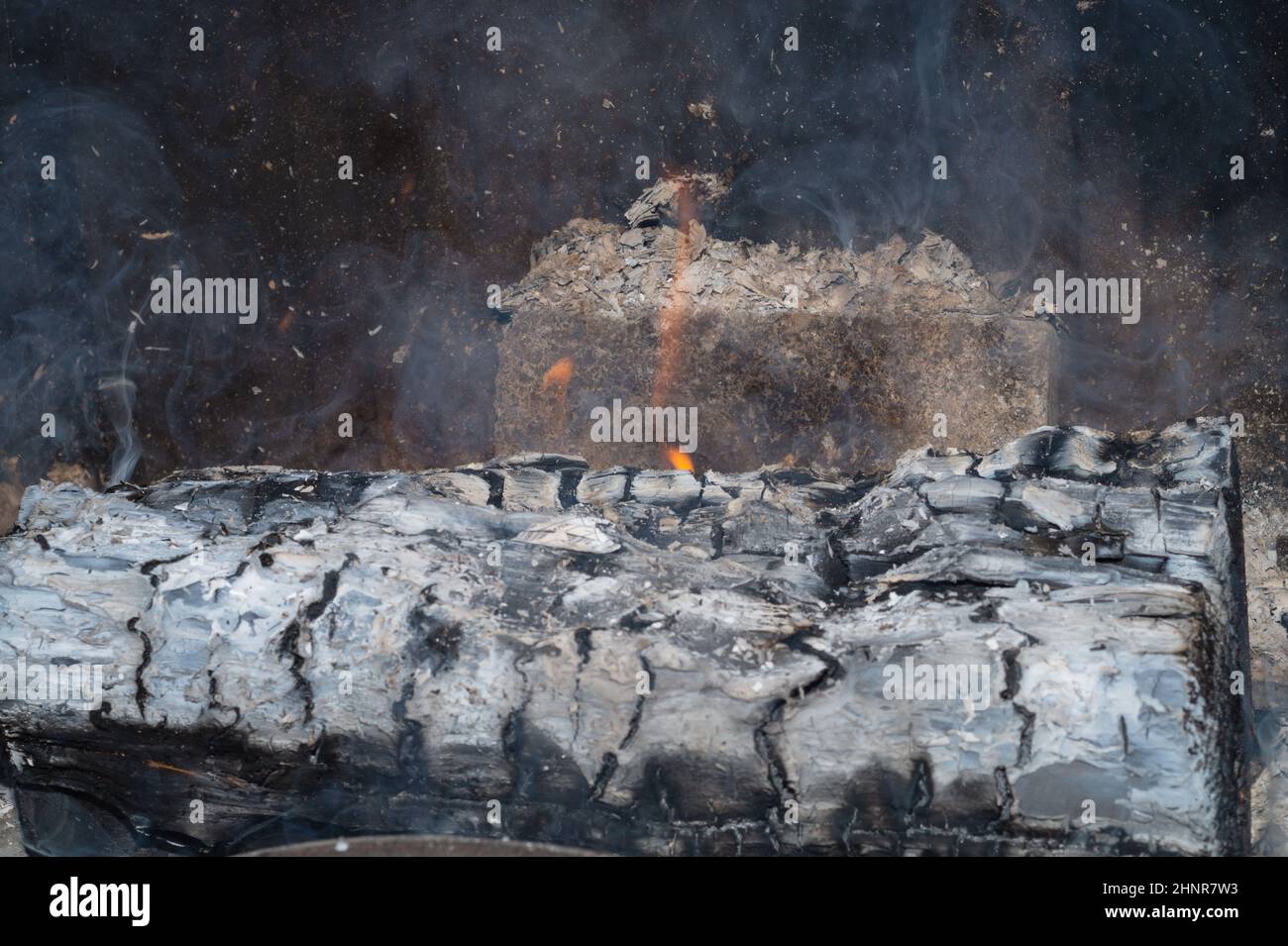 Bonfire fire burning smoldering logs hi-res stock photography and ...