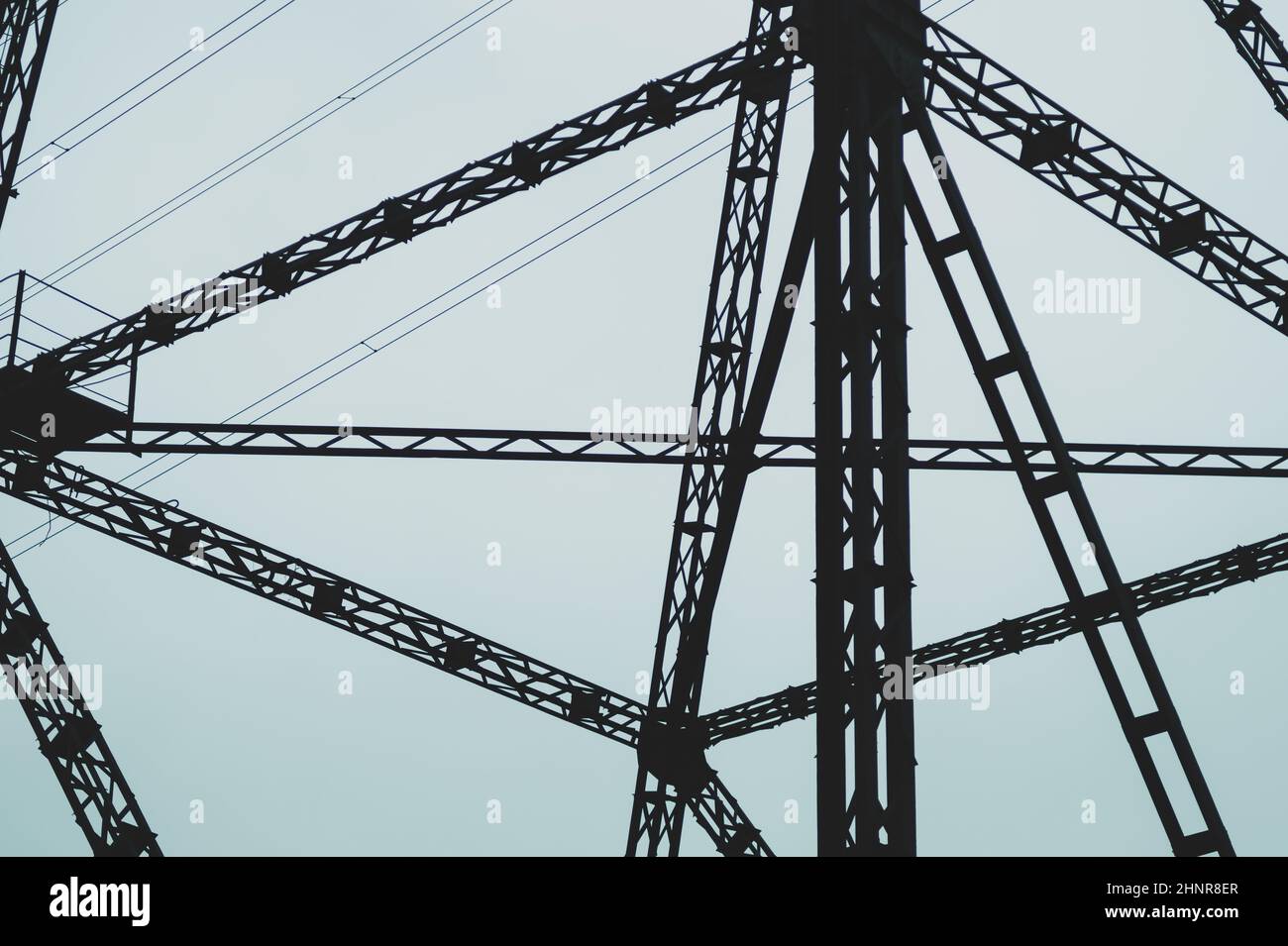 Detail of power line post. high voltage tower with the sky. industrial ...