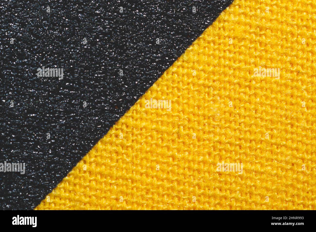 Black and yellow fabric texture. knitted textile close up. woven ...